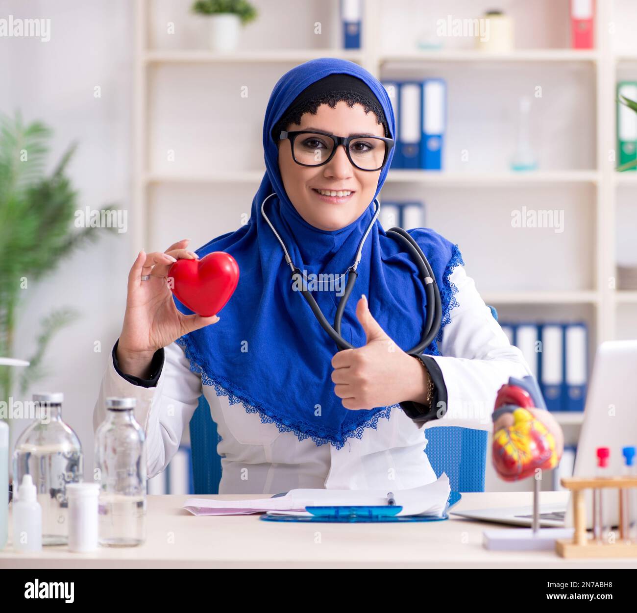The female doctor in hijab working in the hospital Stock Photo - Alamy