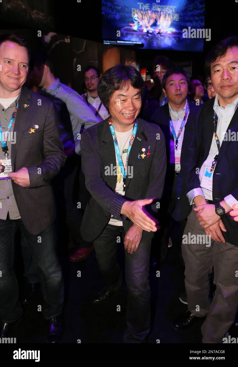 Nintendo video game designer Shigeru Miyamoto, center, visits the ...