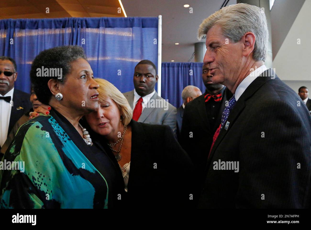 CORRECTS DAY TO WEDNESDAY, NOT TUESDAY - Deborah Bryant, center, hugs ...