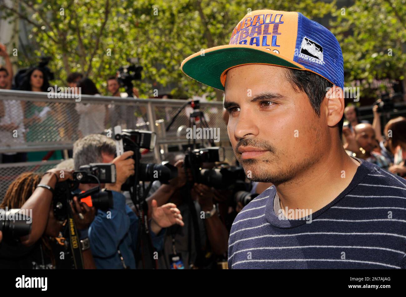Michael Pena, a cast member in the animated 3D film "Turbo," poses at a ...
