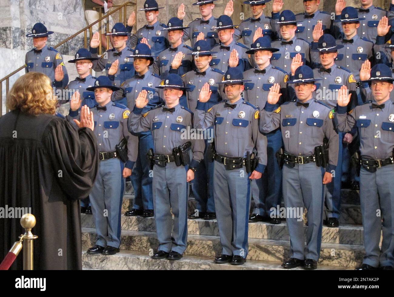 Washington state trooper cadets are sworn in during a graduation ...