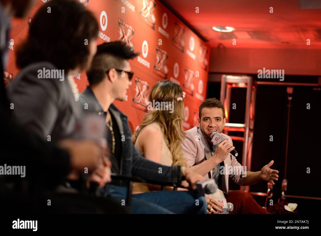 From left to right, singer Chino, singer Belinda, and singer Nacho ...
