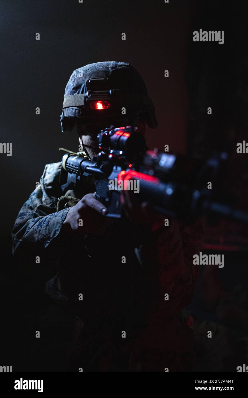 A U.S. Marine with III Marine Expeditionary Force Support Battalion ...