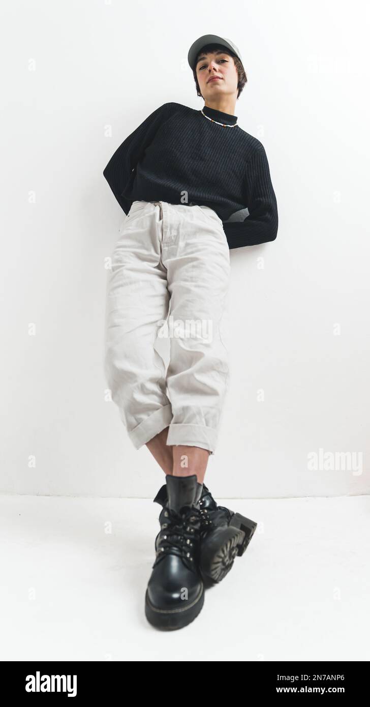 Modern fashion modeling. Fashionable woman in her 20s posing and ...