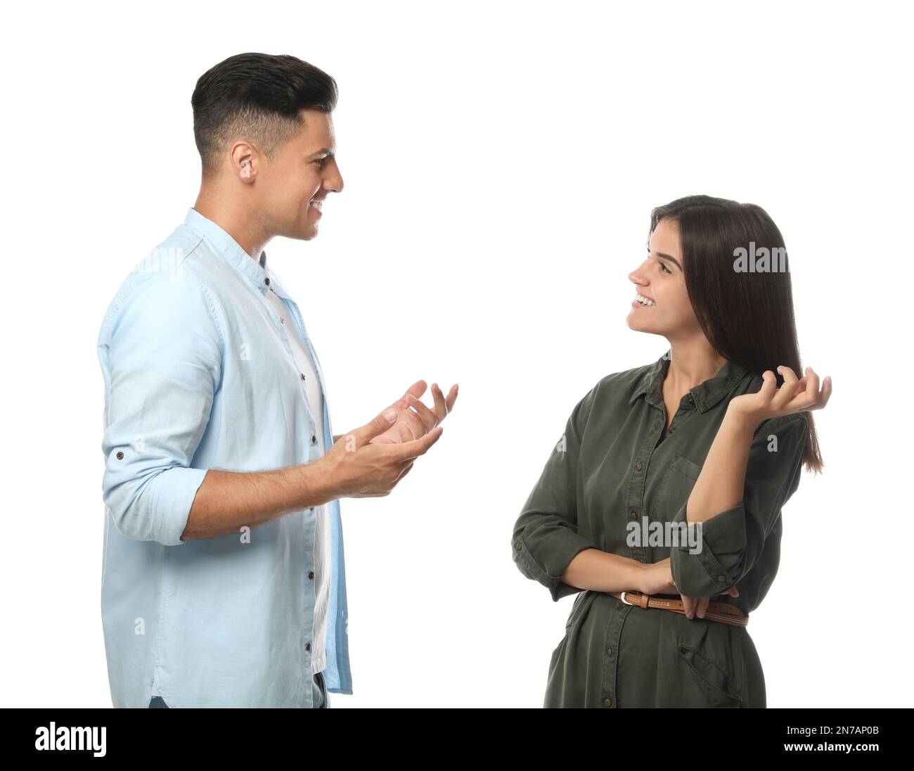 Man and woman talking on white background Stock Photo - Alamy