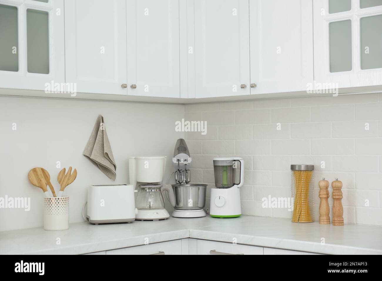 Modern toaster and other home appliances on countertop in kitchen Stock ...