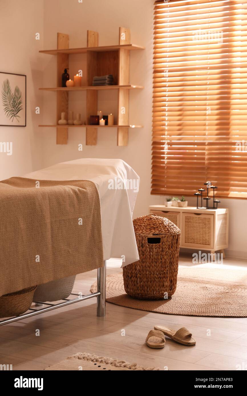 Stylish massage room interior in spa salon Stock Photo - Alamy