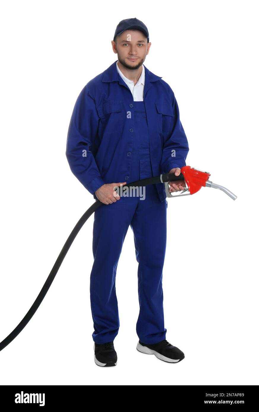 Gas station worker with fuel nozzle on white background Stock Photo - Alamy