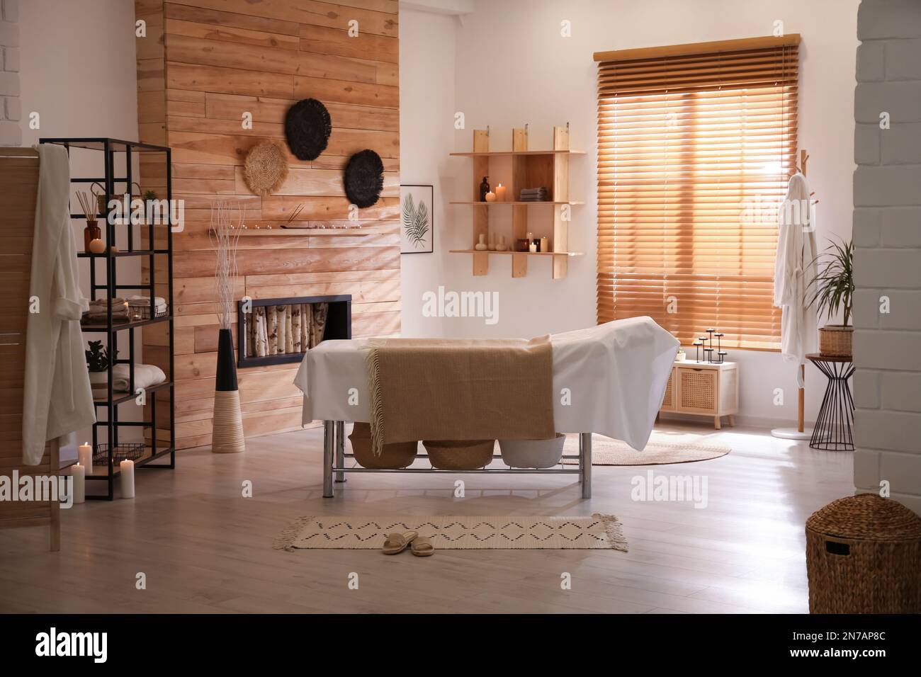 Stylish massage room interior in spa salon Stock Photo - Alamy
