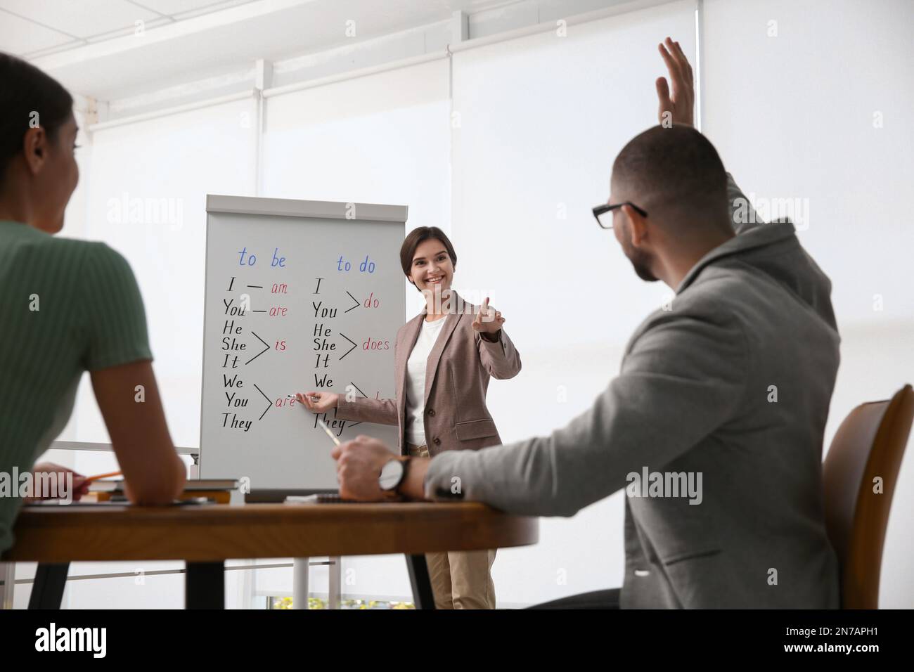 Male tutor whiteboard students teaching hi-res stock photography and ...