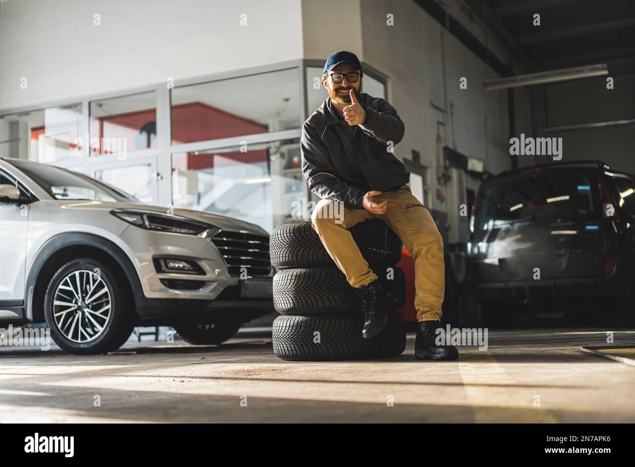Adult repairman mechanic in glasses hi-res stock photography and images ...
