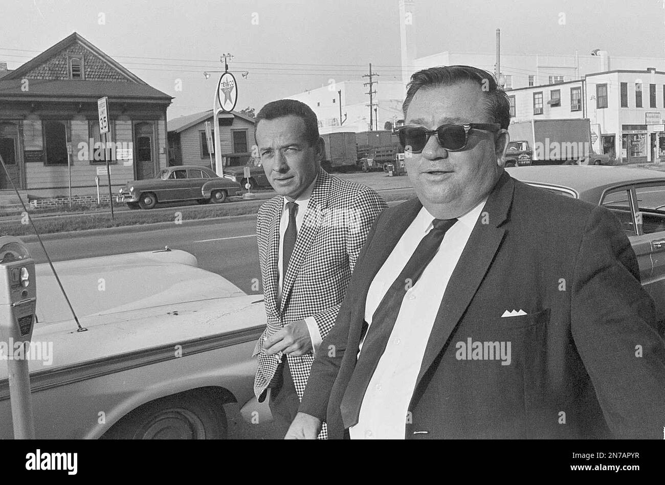 Attorney Dean Andrews Jr., foreground, leaves a court building after ...