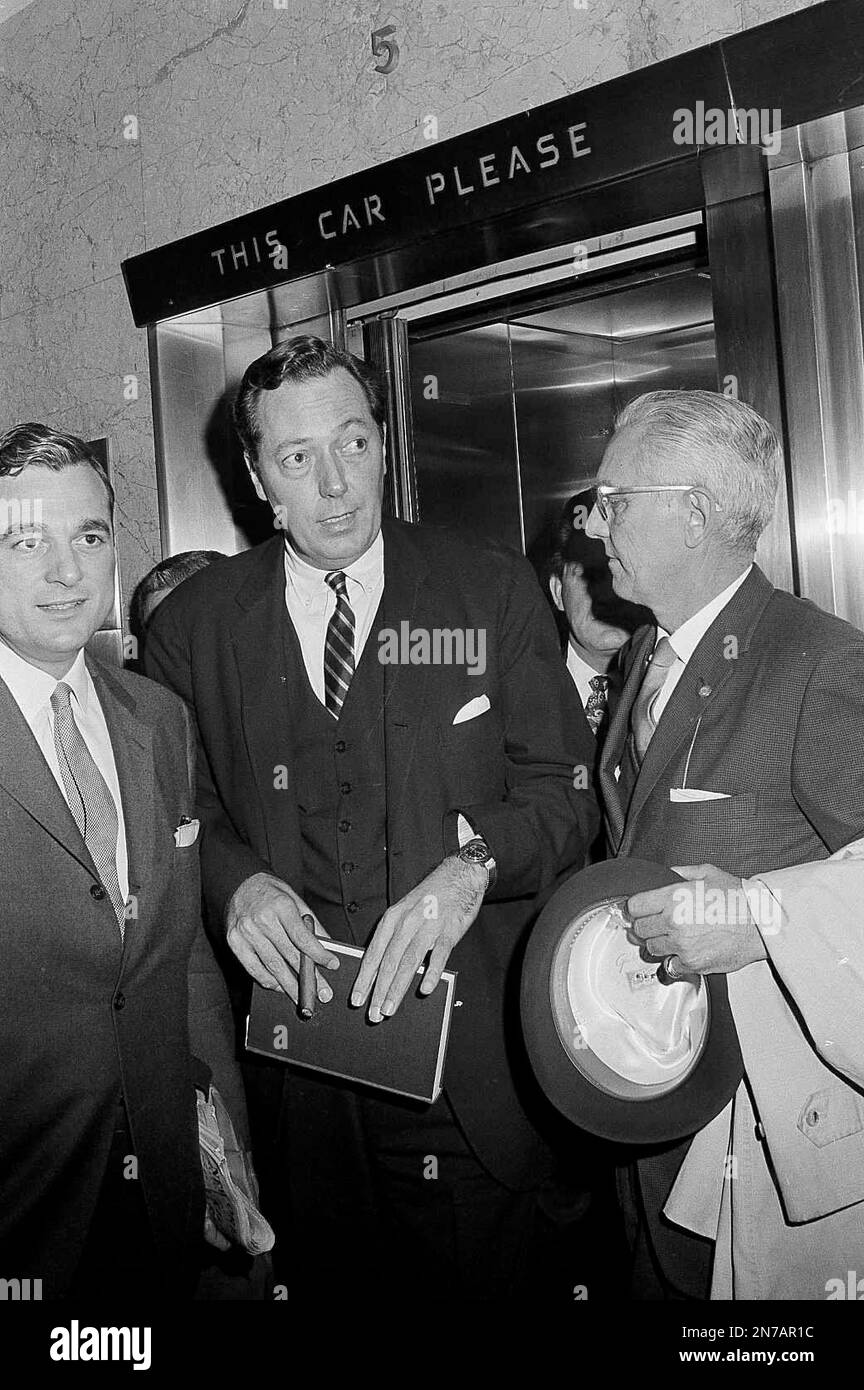 New Orleans District Attorney Jim Garrison, left, is flanked by Cecil M ...