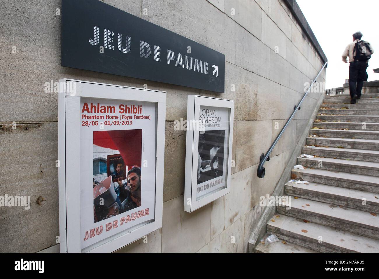 A poster of the exhibit Phantom Home, by Palestinian photographer Ahlam ...