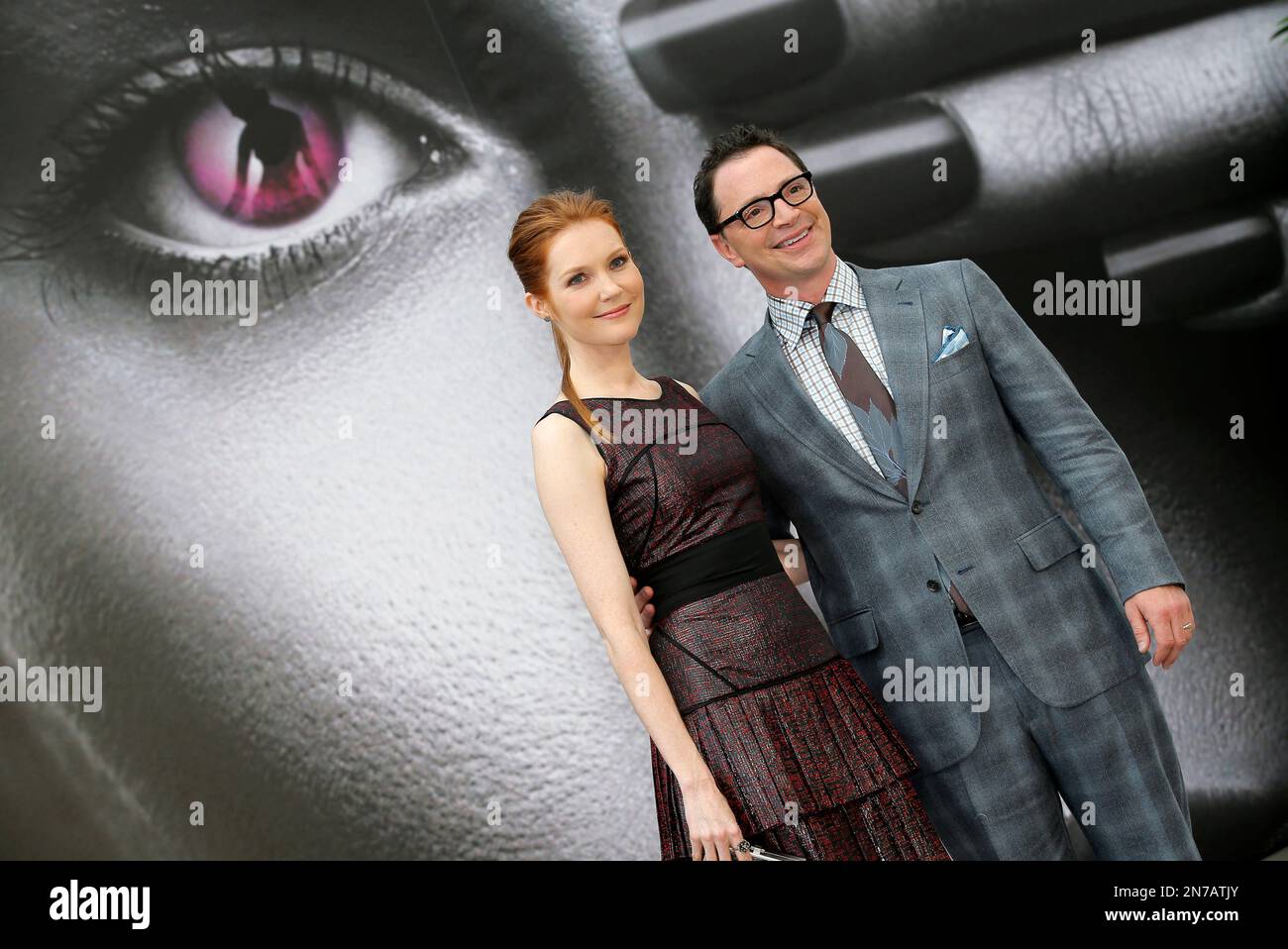 Actors Joshua Malina and Darby Stanchfield of TV series "Scandal" pose ...
