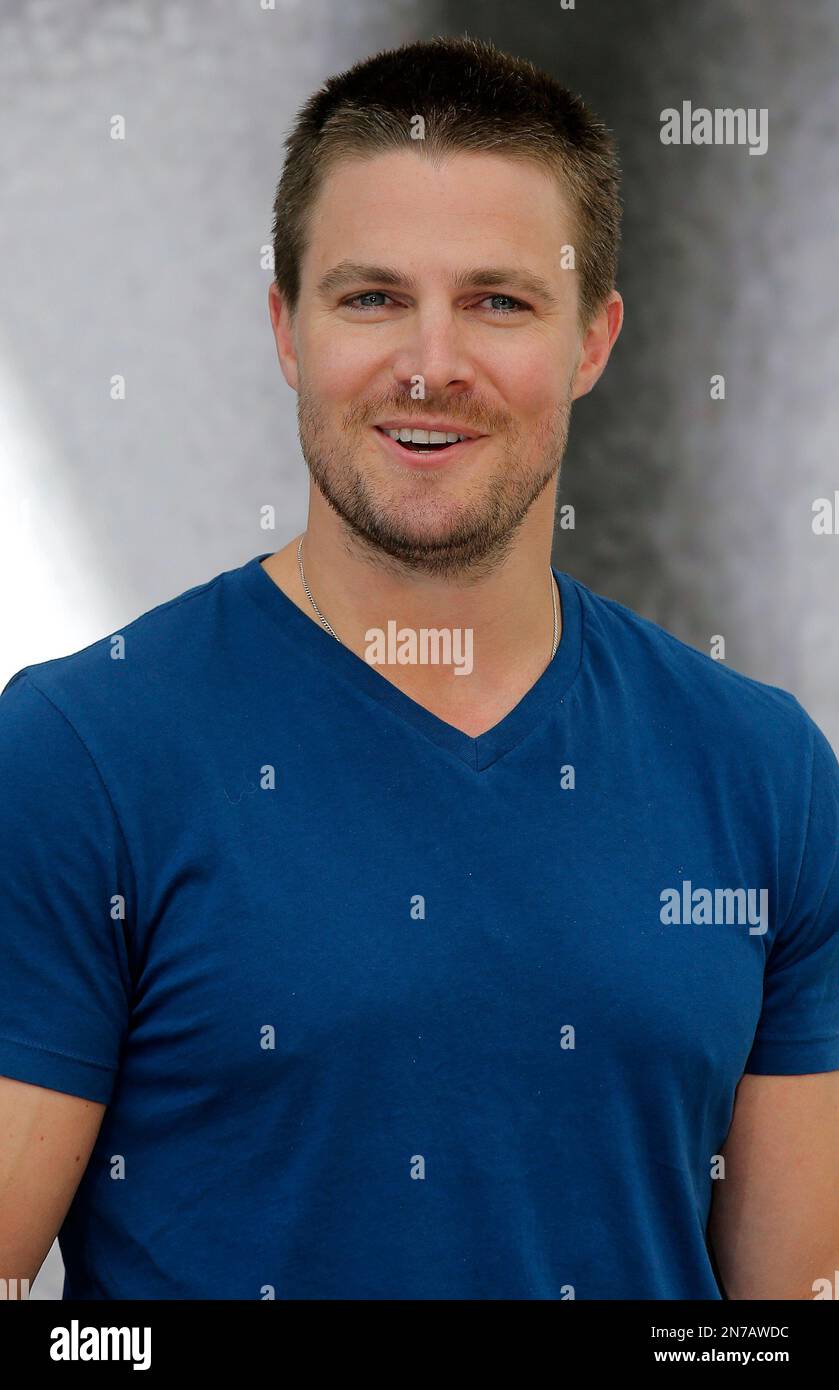 Actor Stephen Amell of the TV series "Arrow" poses for photographers ...