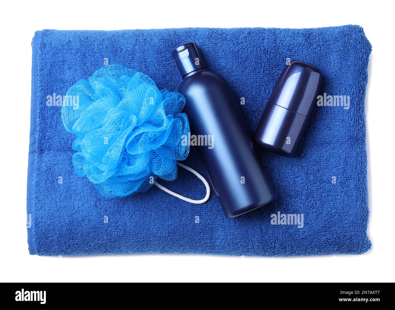 Shampoo, roller deodorant, towel and bast wisp isolated on white, top ...