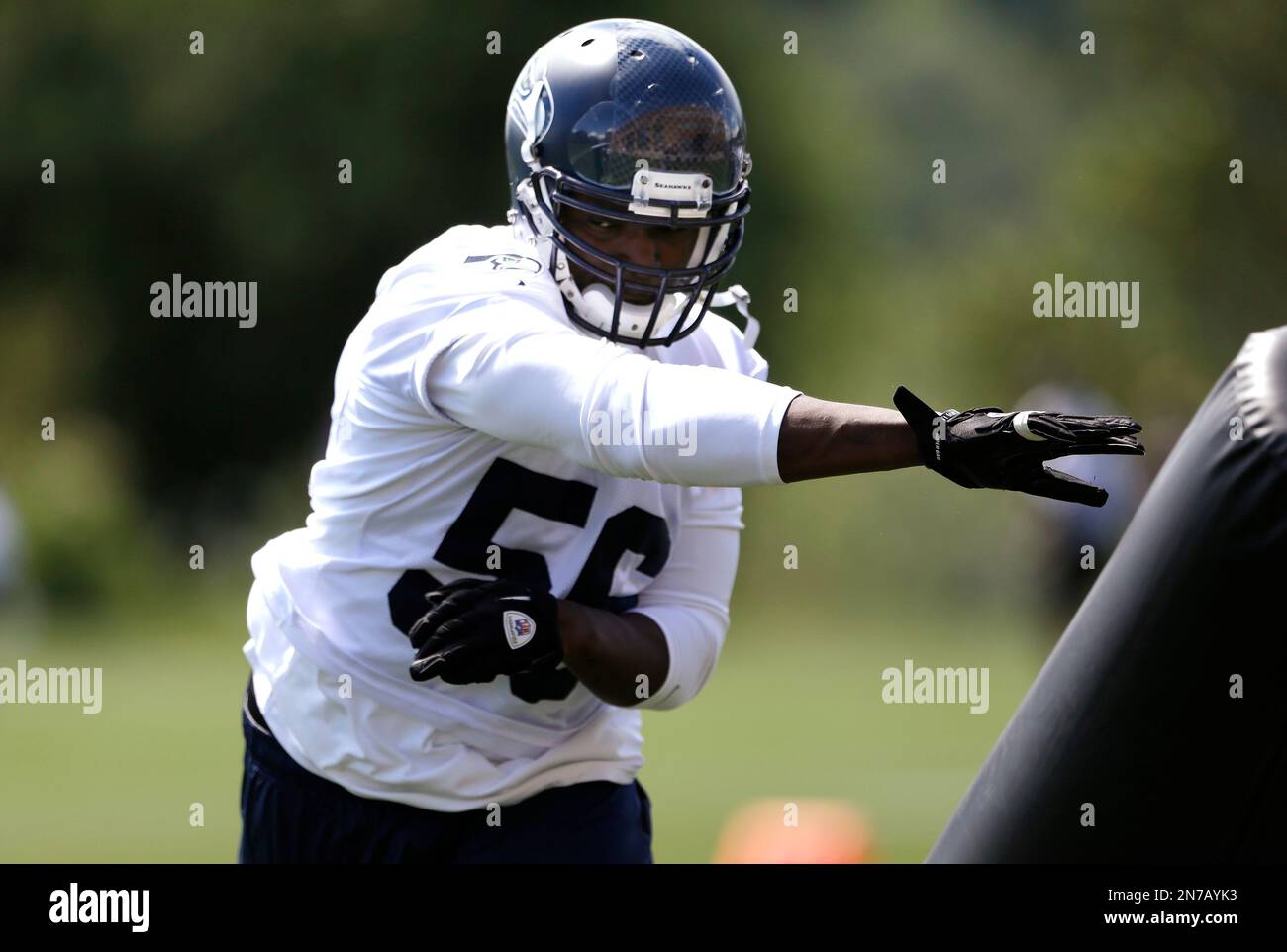 Seattle Seahawks' Cliff Avril runs through a drill during NFL football ...
