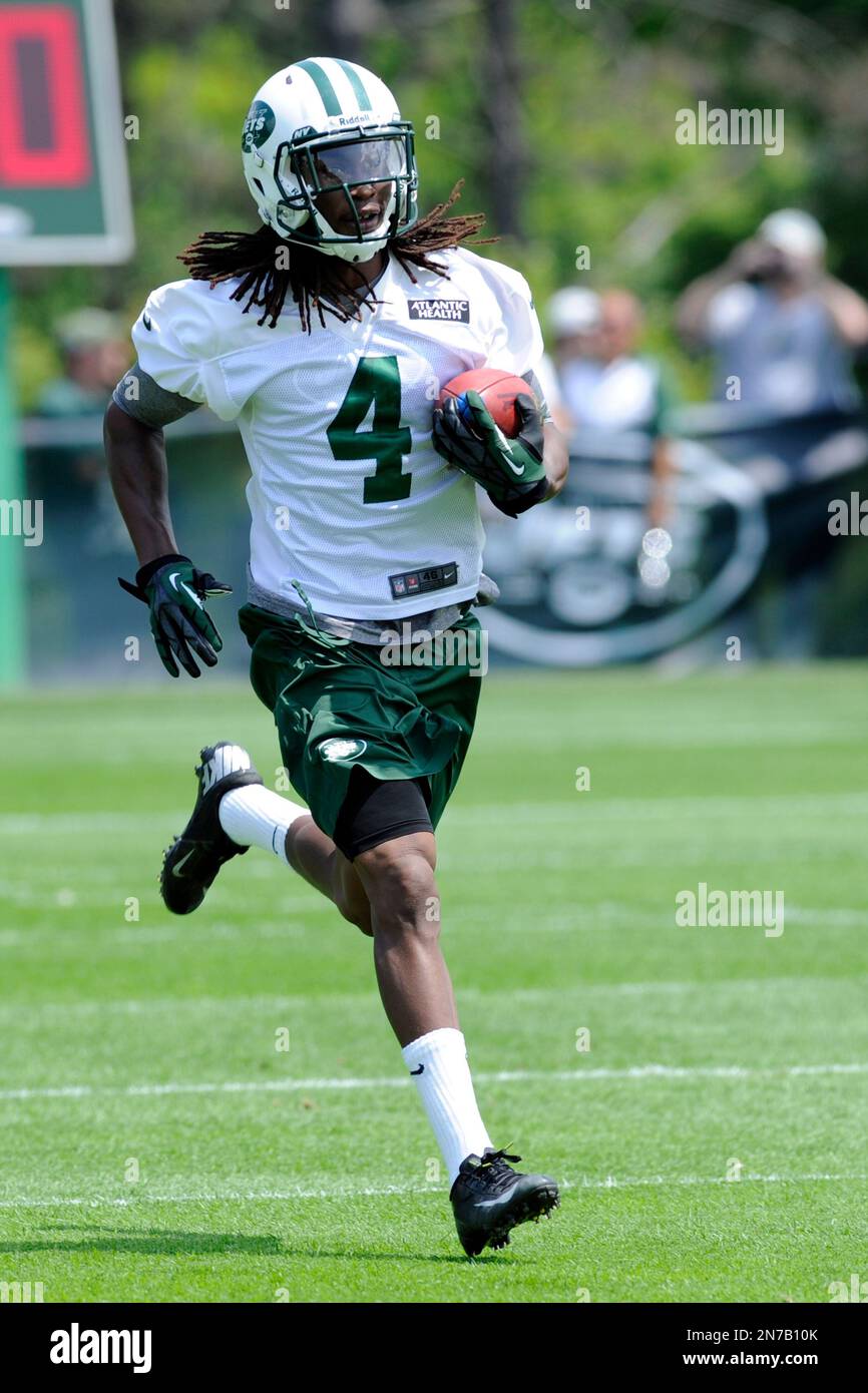 New York Jets wide receiver Joseph Collins runs with the ball during ...