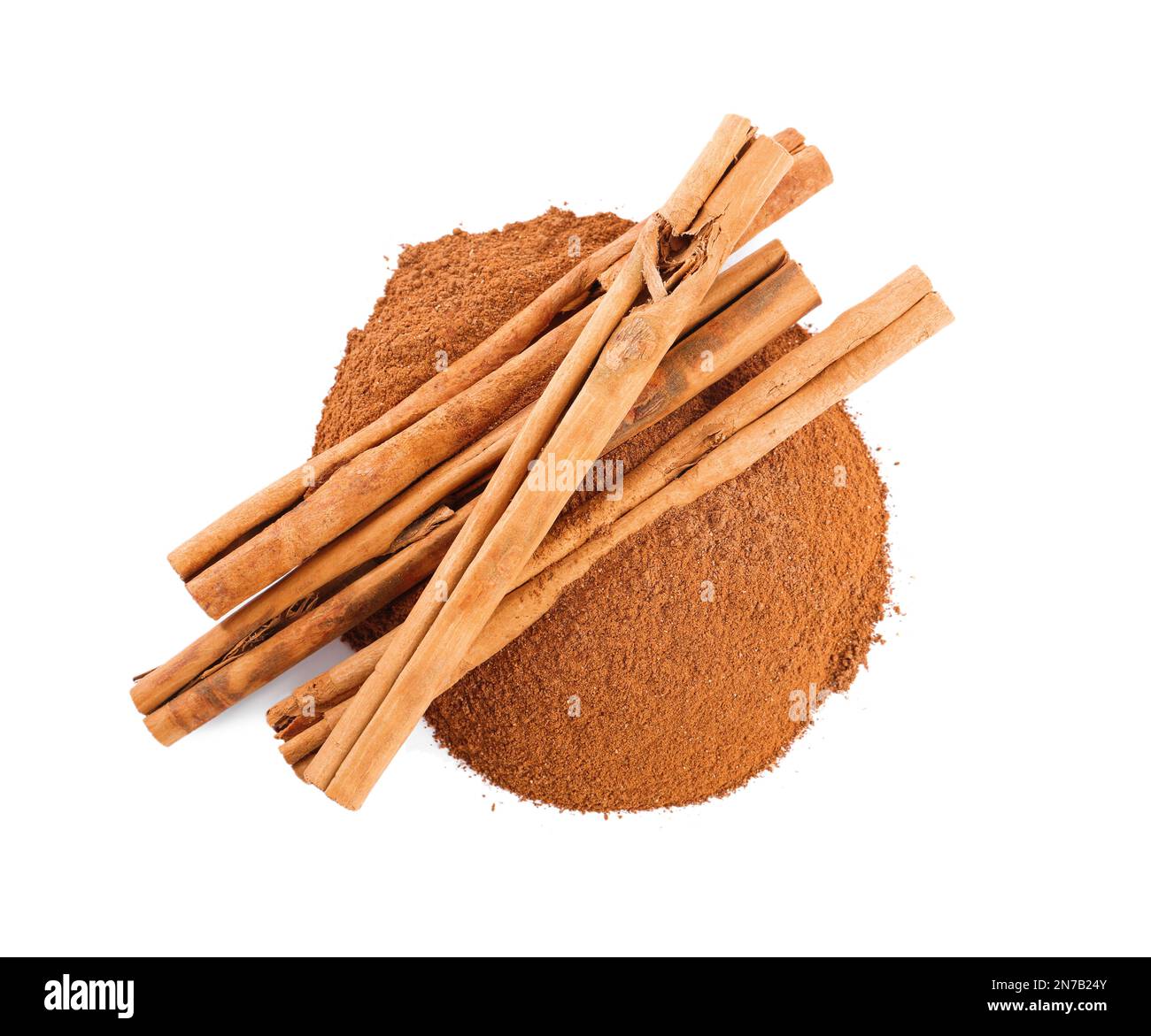 Aromatic cinnamon sticks and powder on white background, above view ...