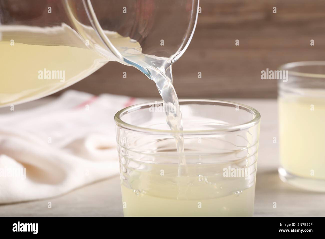 Pouring juice pitcher glass hi-res stock photography and images - Alamy