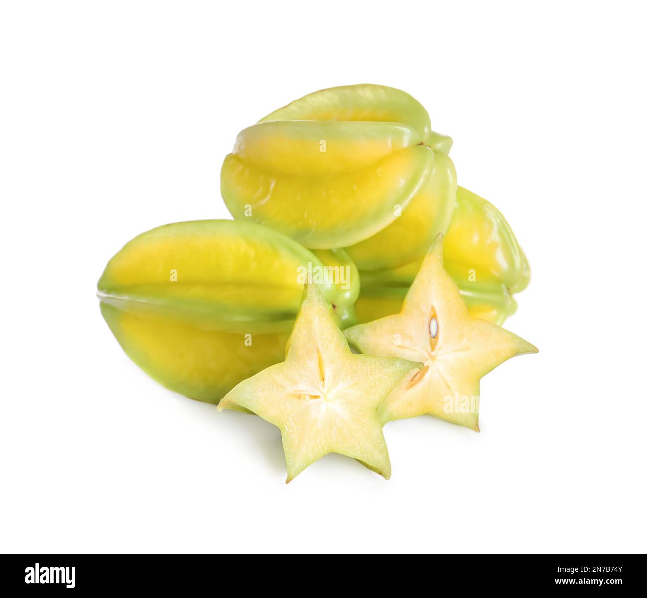 Cut and whole carambolas on white background Stock Photo - Alamy