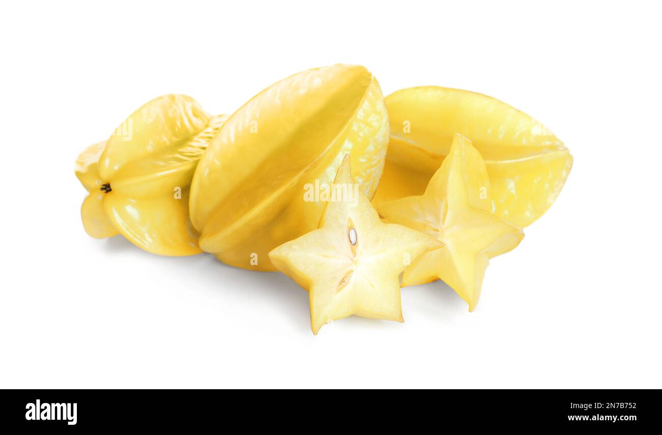 Cut and whole carambolas on white background Stock Photo - Alamy