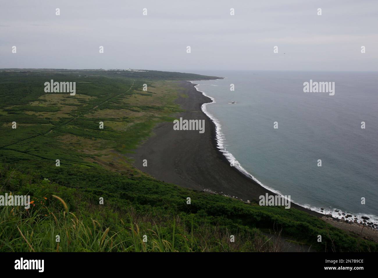 Invasion beach is seen from the summit of Mt. Suribachi, on Iwo Jima ...