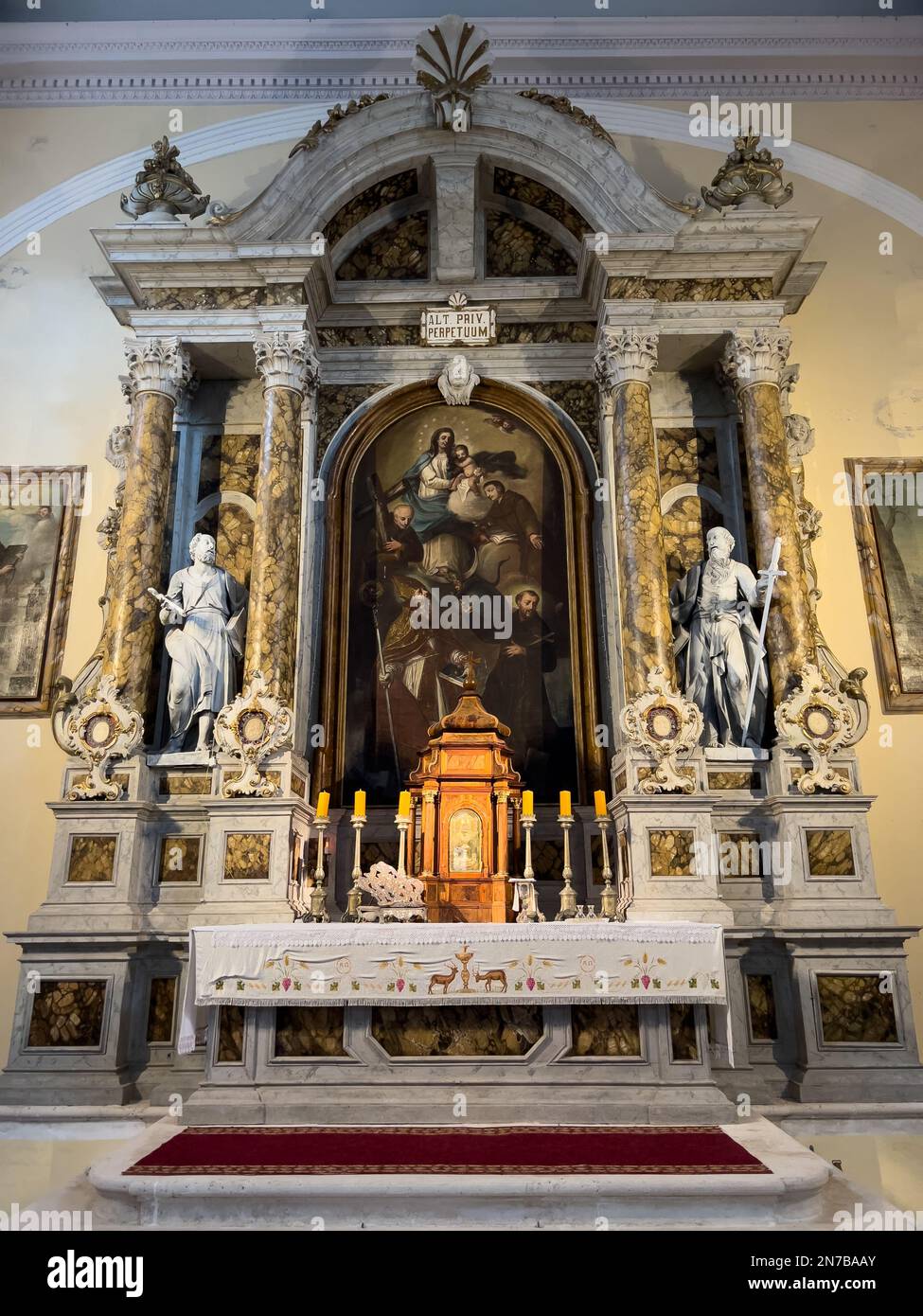 Catholic church altar with icons, statues and columns Stock Photo - Alamy