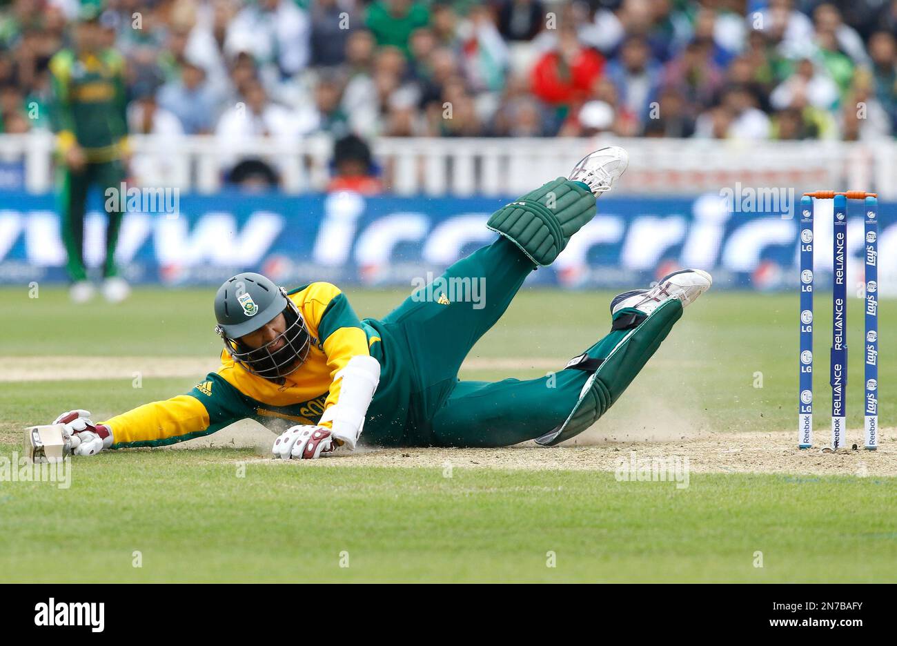 South Africa's Hashim Amla makes his ground during an ICC Champions ...