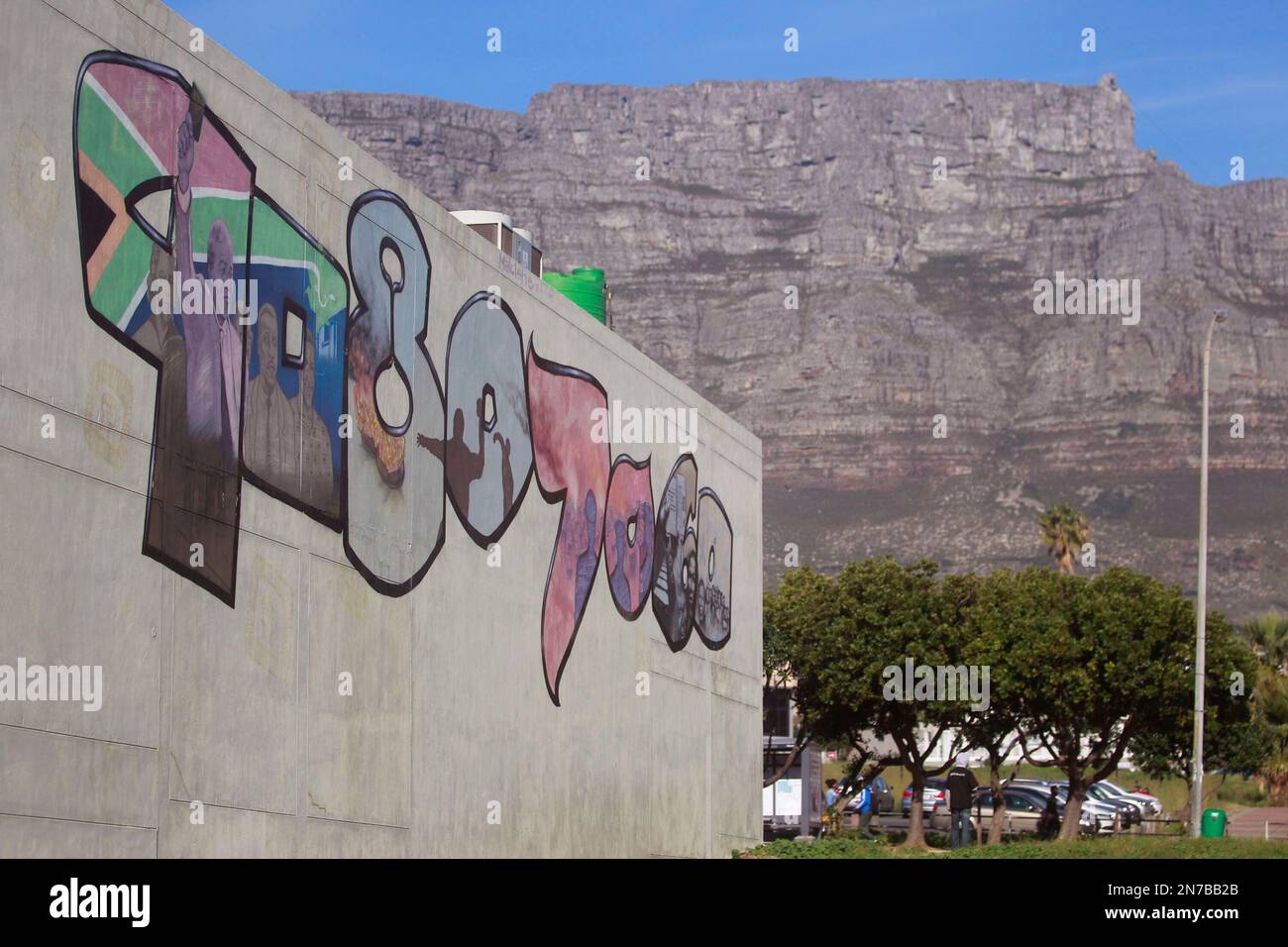 A mural depicting former South African President Nelson Mandela, left ...