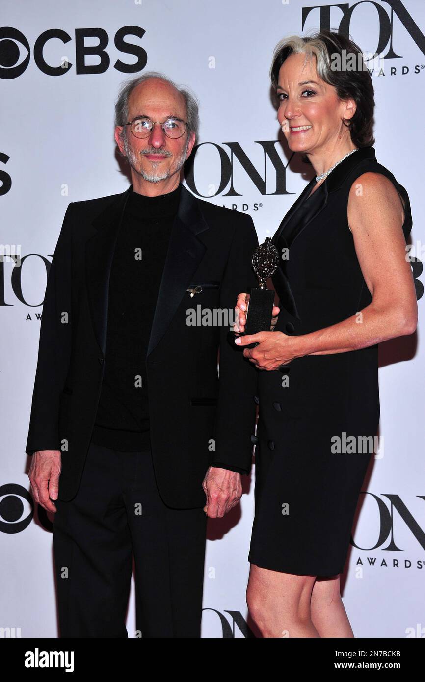 Peggy Eisenhauer and Jules Fisherposes pose with their award in the ...