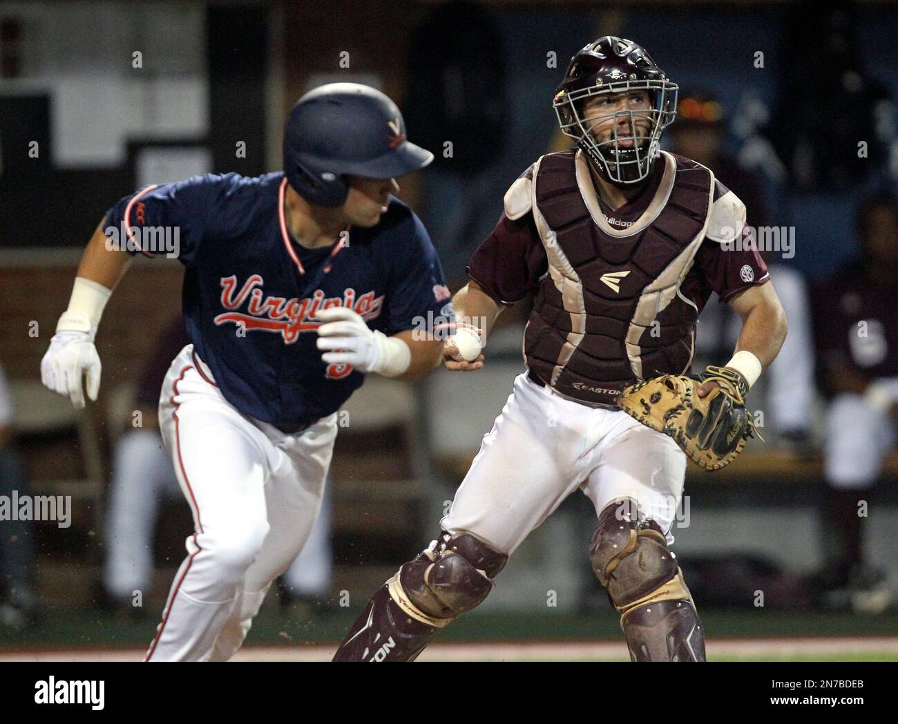 Mississippi State's Nick Ammirati (17) throws to first base next to ...