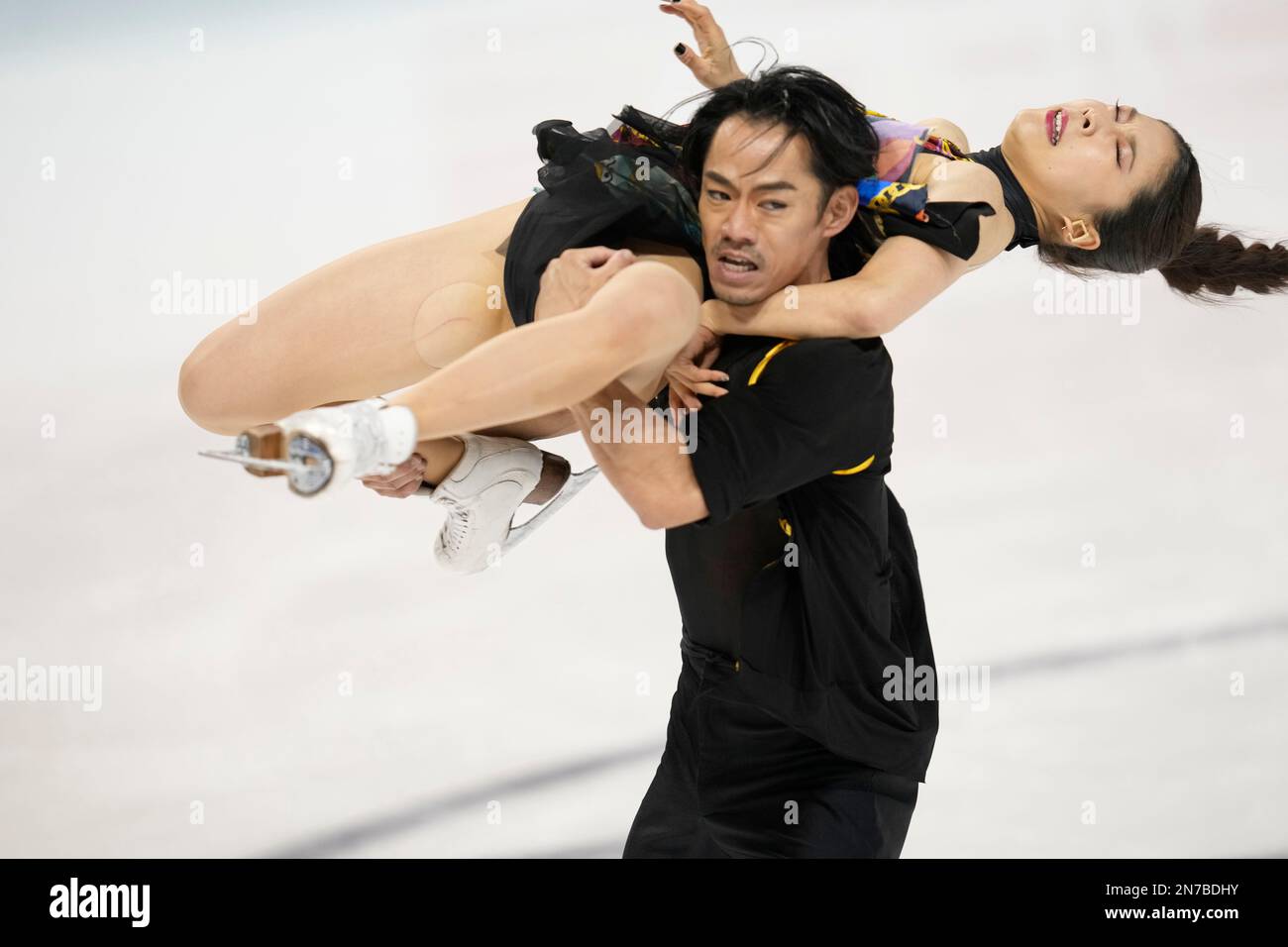 Kana Muramoto and Daisuke Takahashi, of Japan, perform in the ice dance ...