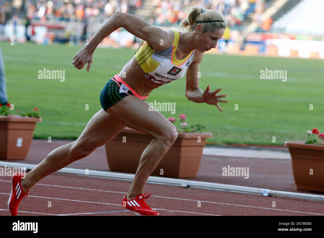 Romania's Angela Morosanu competes in the women's 400-meter hurdles at ...