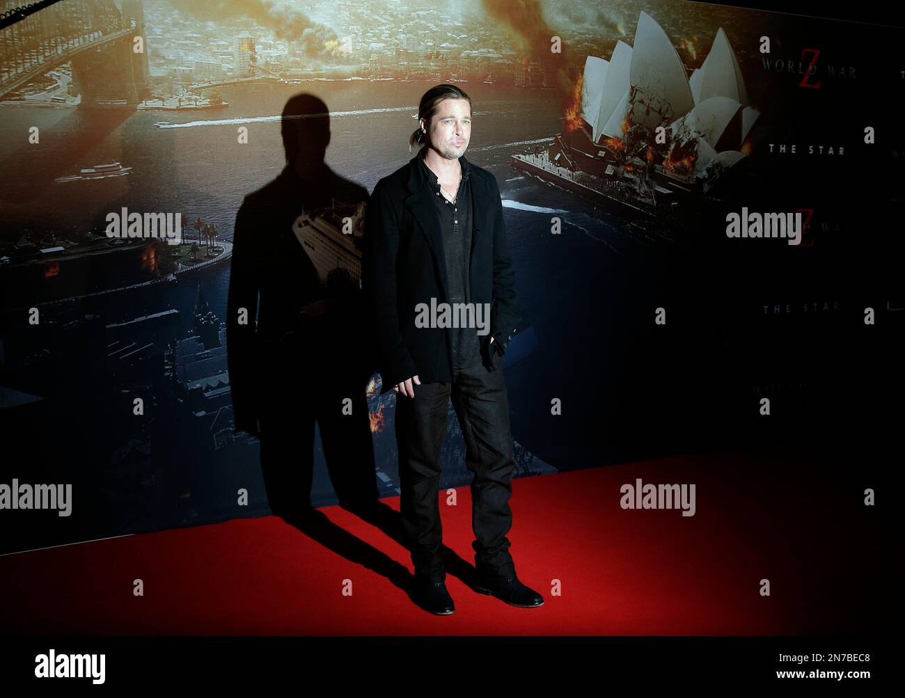 Actor Brad Pitt poses for a photo on the red carpet during the premiere ...