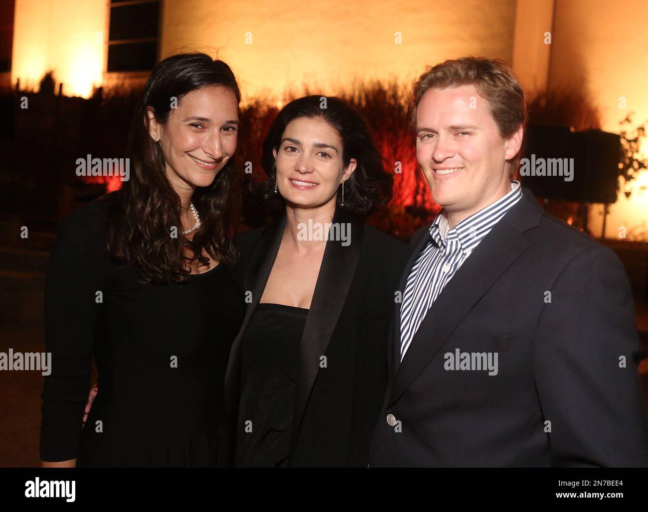 From left, Betina Korek, Elizabeth Chandler and Otis Chandler pose ...