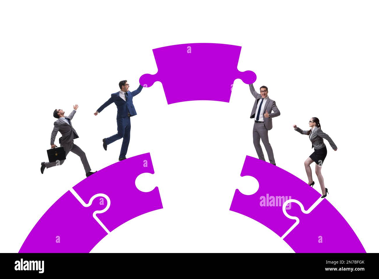 Business people building bridge in the teamwork concept Stock Photo - Alamy