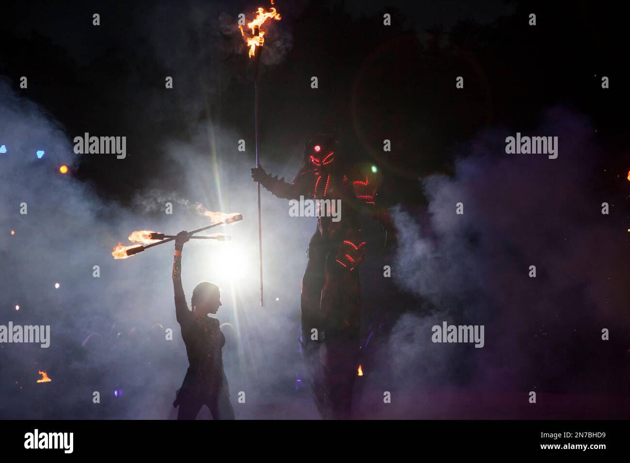 Fireshow artists showing their skills at the universal carnival of fire ...
