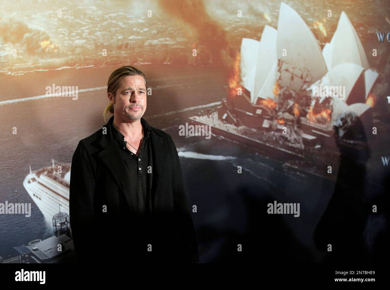 Actor Brad Pitt poses for photos on the red carpet during the ...