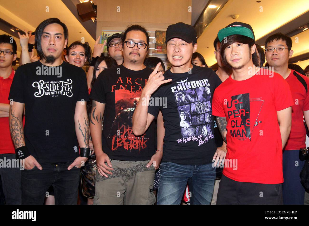 Taiwanese pop group ChthoniC members pose during a fan meeting in ...