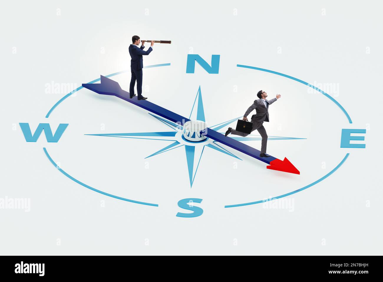 Businessman with the compass looking for direction Stock Photo - Alamy