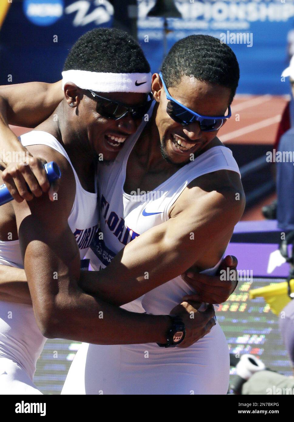 Florida's Hugh Graham, Jr., left, hugs teammate Arman Hall after ...