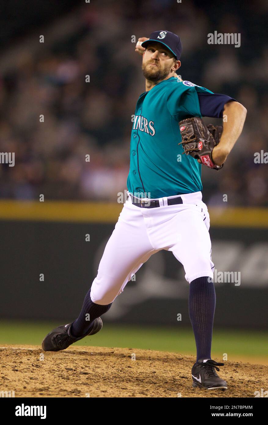 Seattle Mariners reliever Tom Wilhelmsen delivers a pitch during a game ...