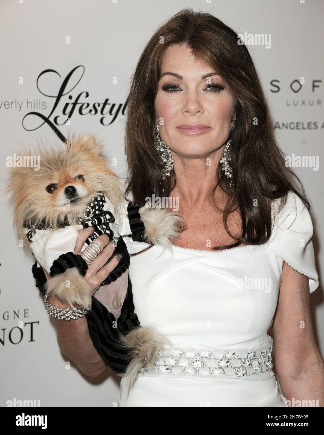 Lisa Vanderpump, with her dog Giggy arrives at the Beverly Hills ...