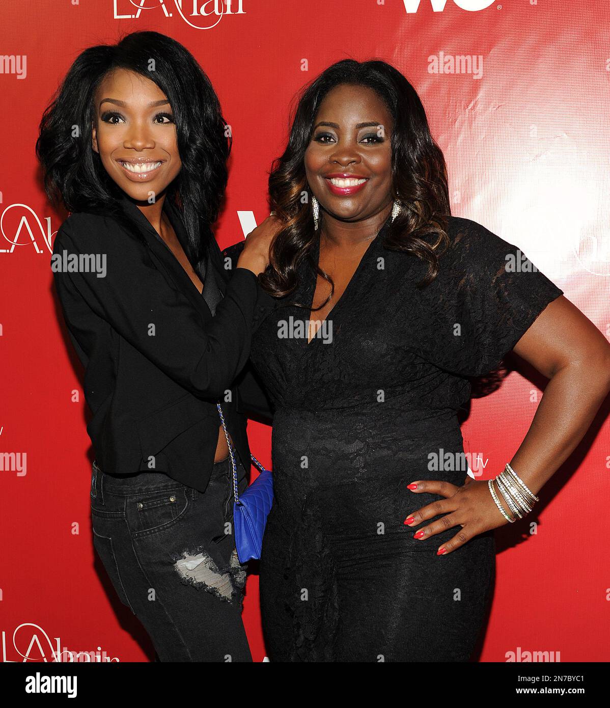 Brandy (left) and Kim Kimble attend the WEtv LA Hair Season 2 Screening ...