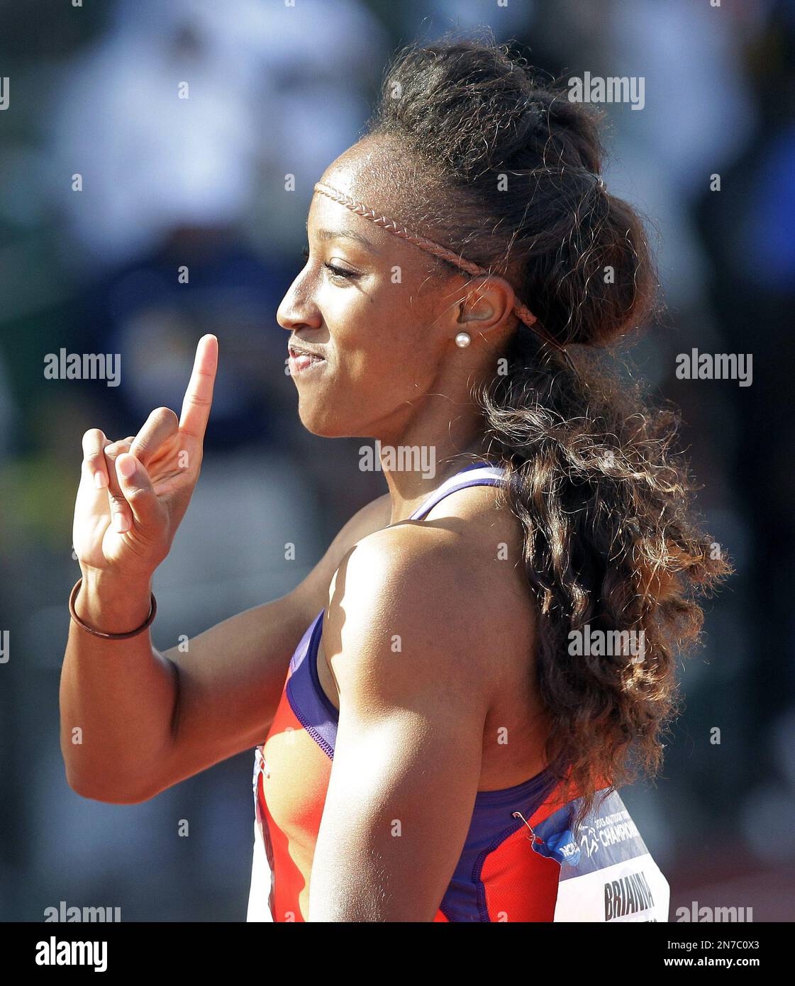 Clemson's Brianna Rollins gestures after winning her heat in the 100 ...