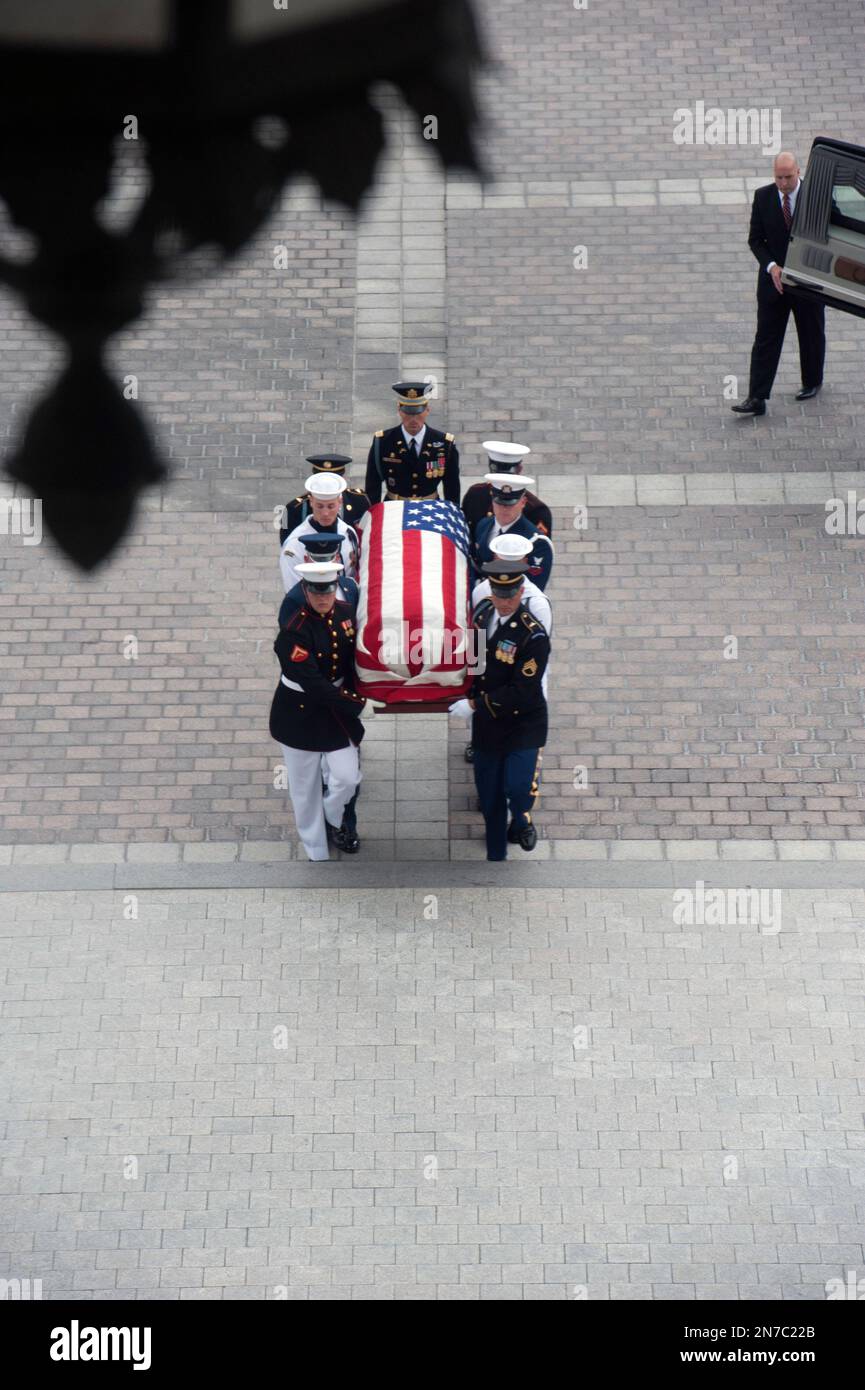 Members of the U.S. Army Old Guard military pall bearers carry the ...