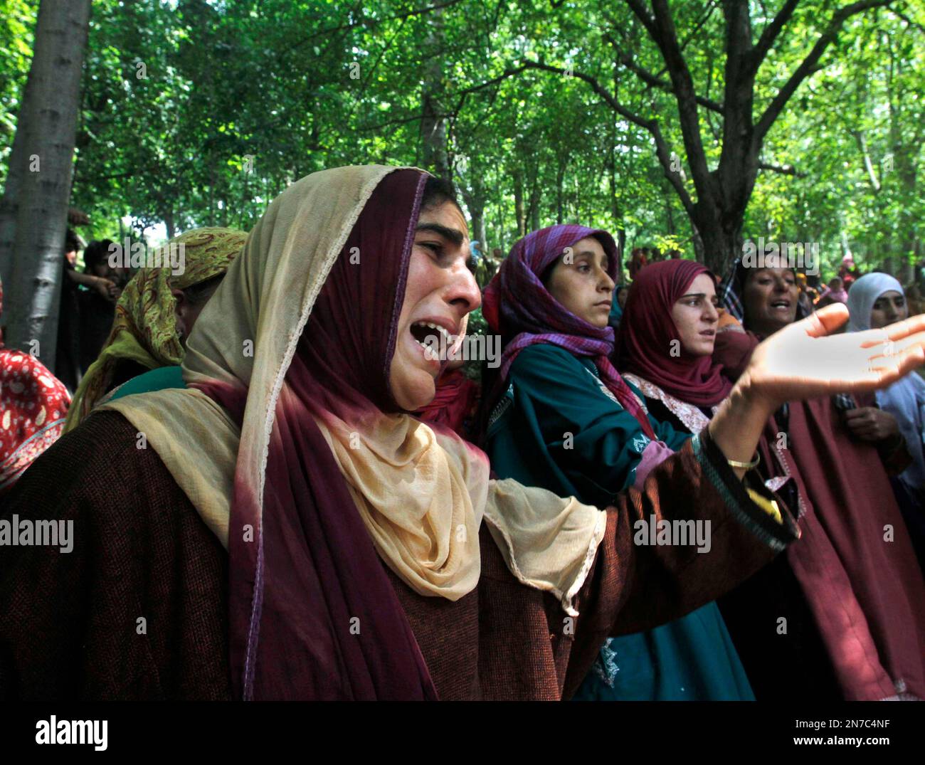 Kashmiri women react as villagers carry the body of Altaf Baba alias ...