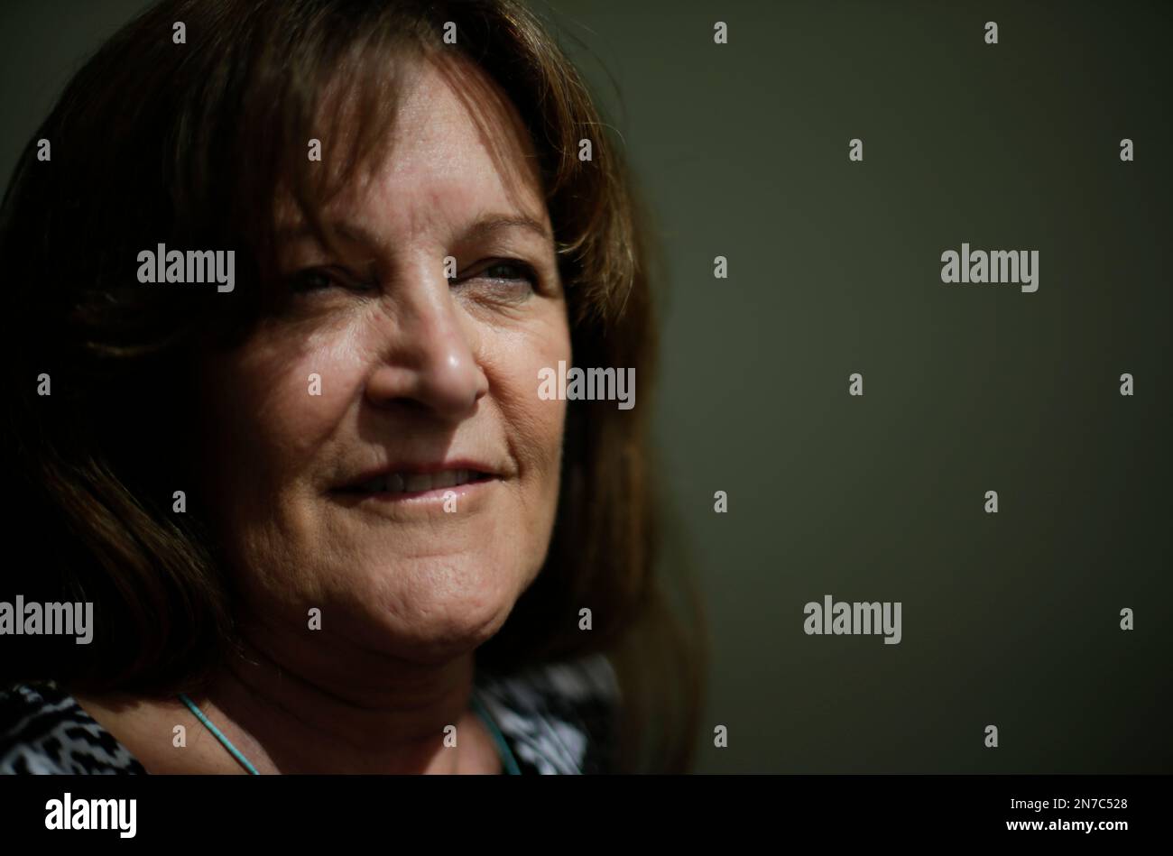 Rita Soza poses for a picture in her home in Encinitas, Calif ...